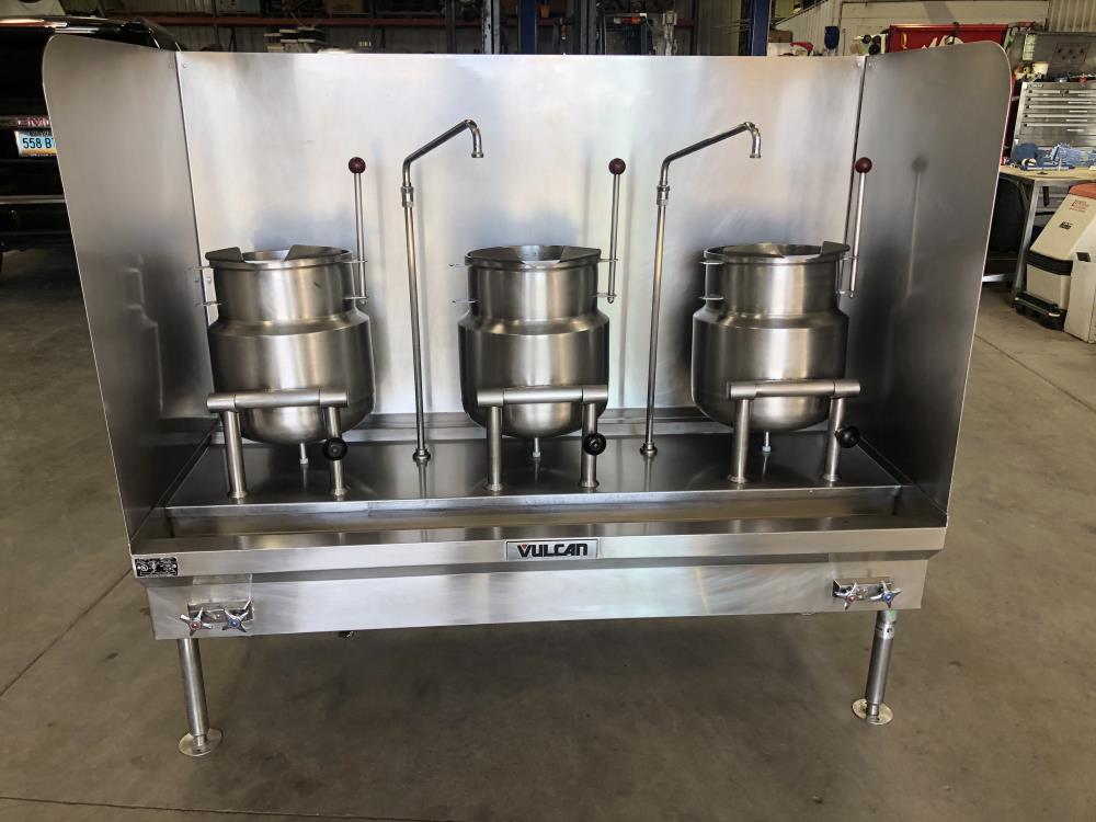 Vulcan VKT64/666 64" Table with (3) 6 Gallon Direct Steam Tilting Kettles