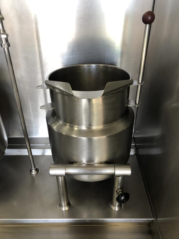 Vulcan VKT64/666 64" Table with (3) 6 Gallon Direct Steam Tilting Kettles