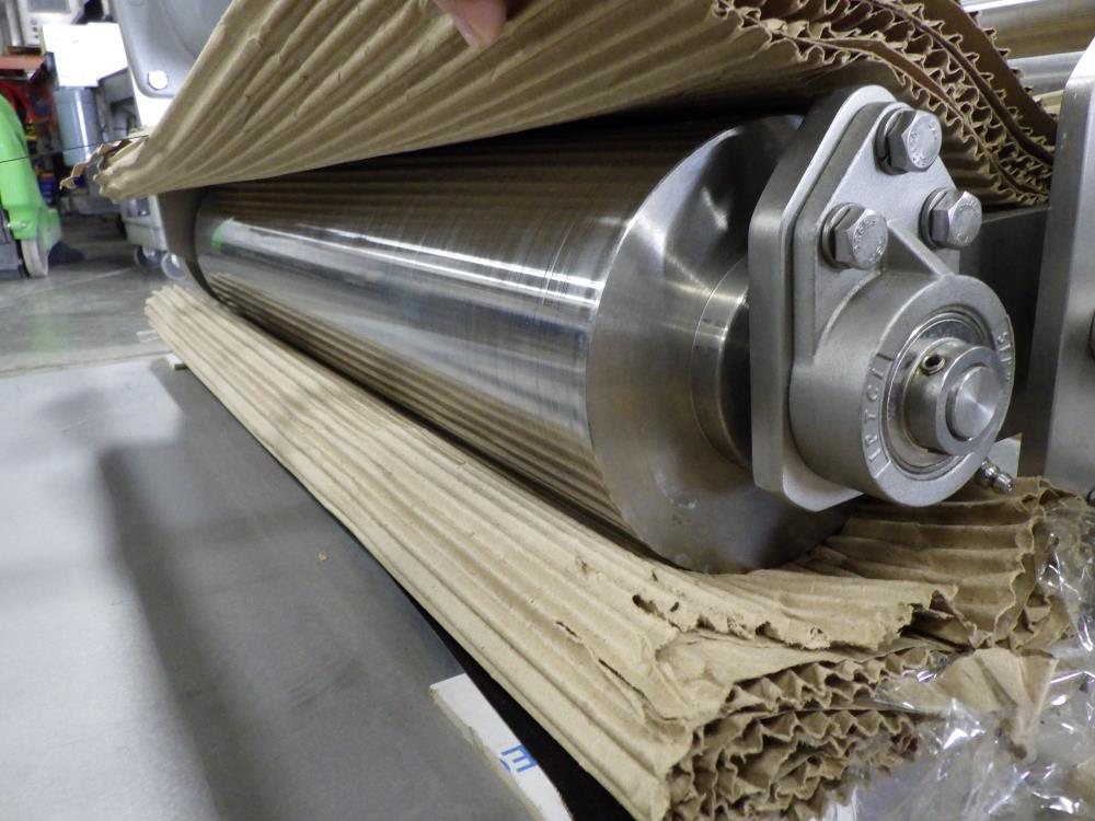 New Moline Folding Station and Compression Roller