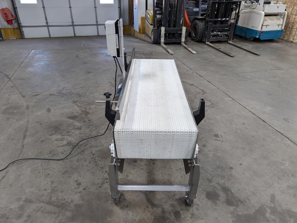 Texwrap/ProMach SS plastic belt conveyor